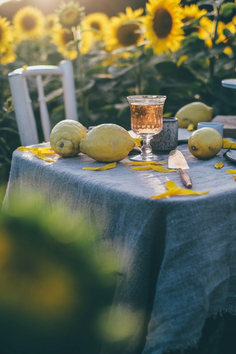 A Dreamy Table Setting in a Field of Sunflowers - Our Food Stories